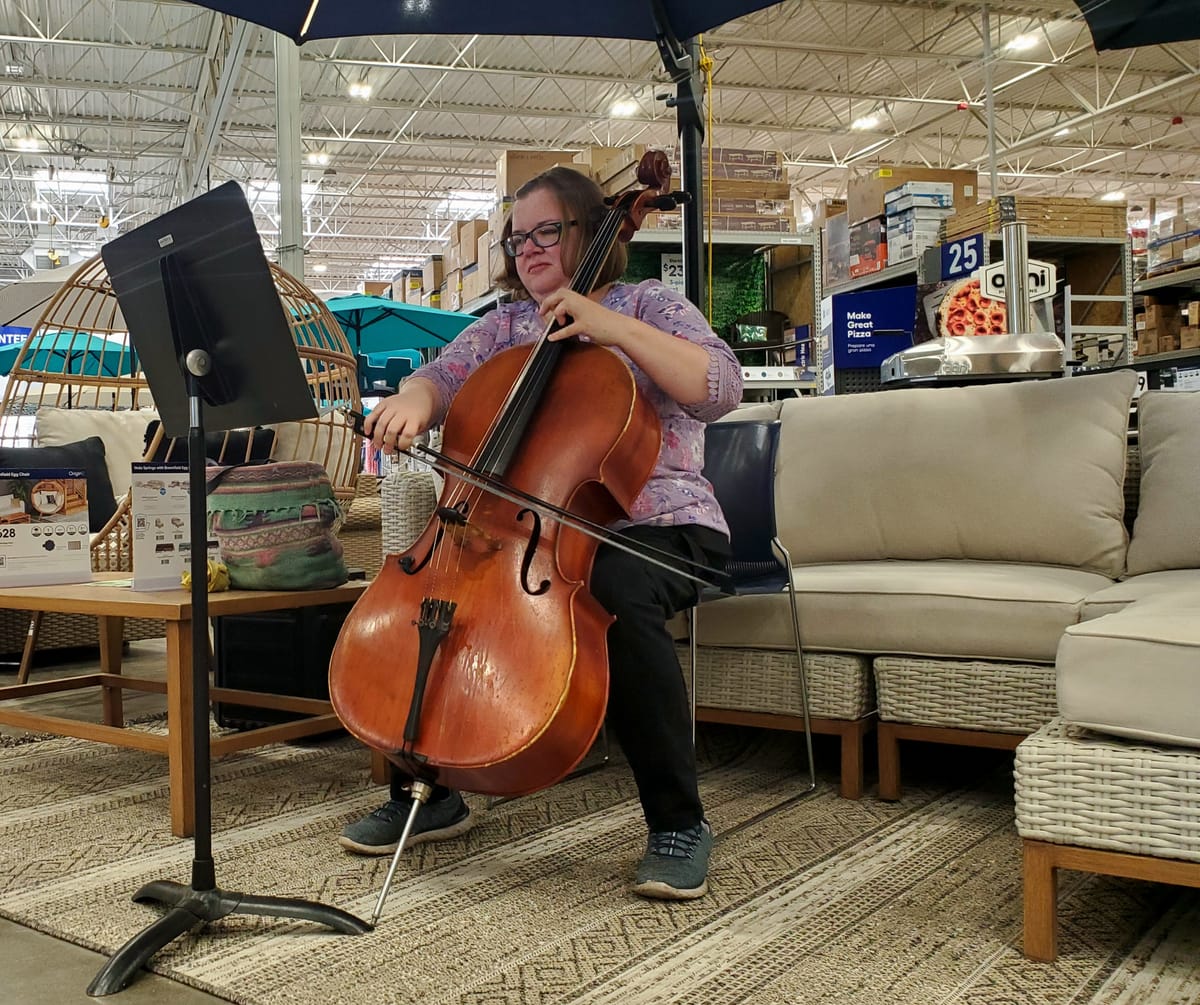 Amy Collins Plays Pop-up Cello Performance